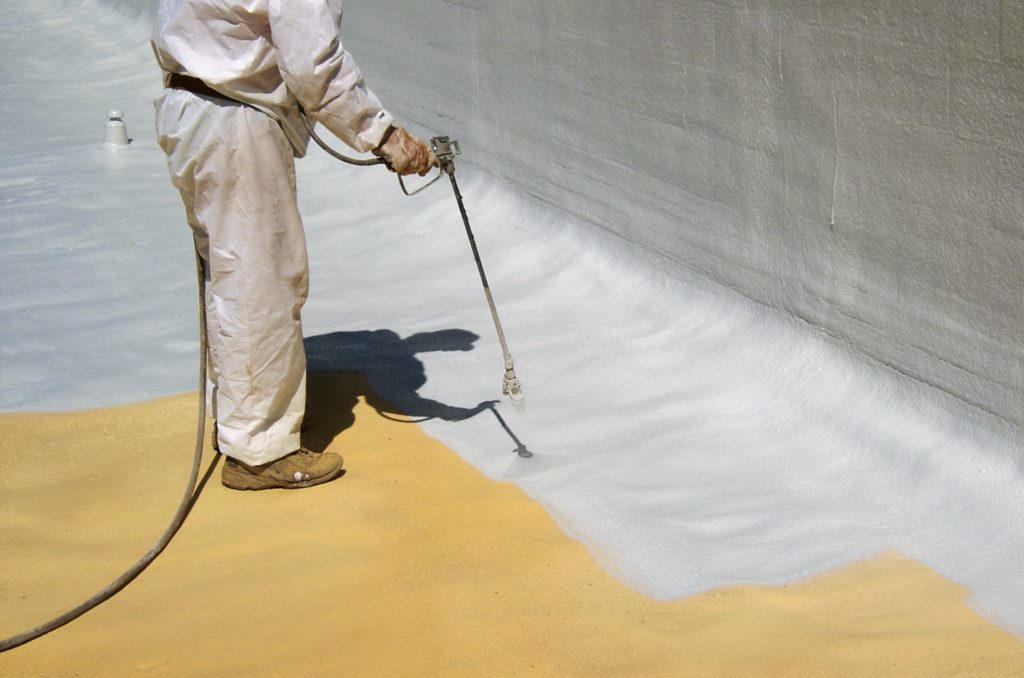 Apply silicone coating over spray foam on roof to protect from sunlight ...